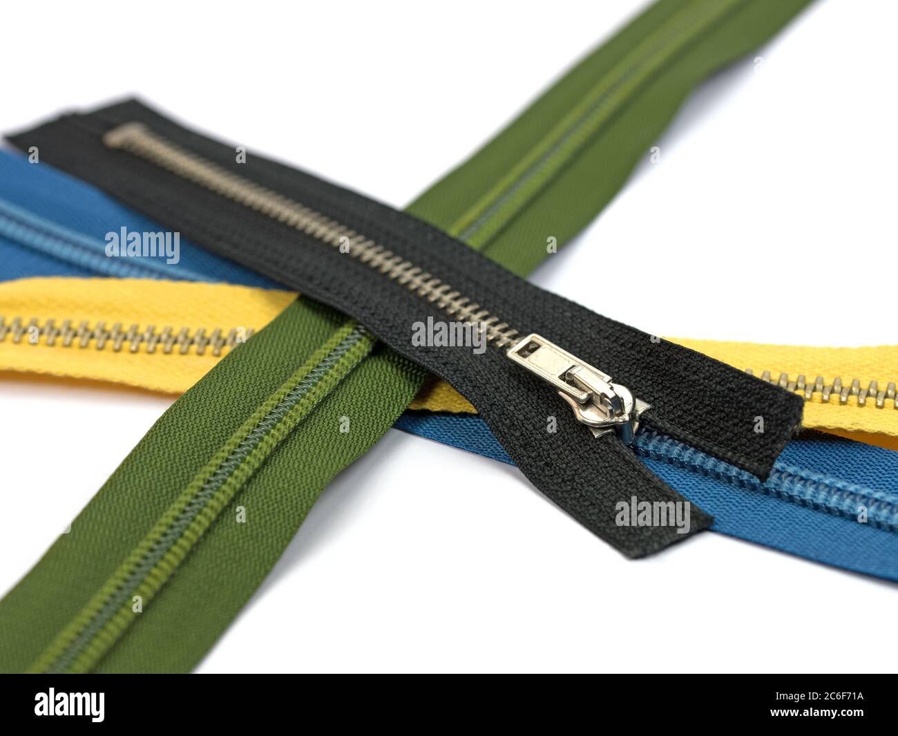 Colorful zippers against white background Stock Photo - Alamy