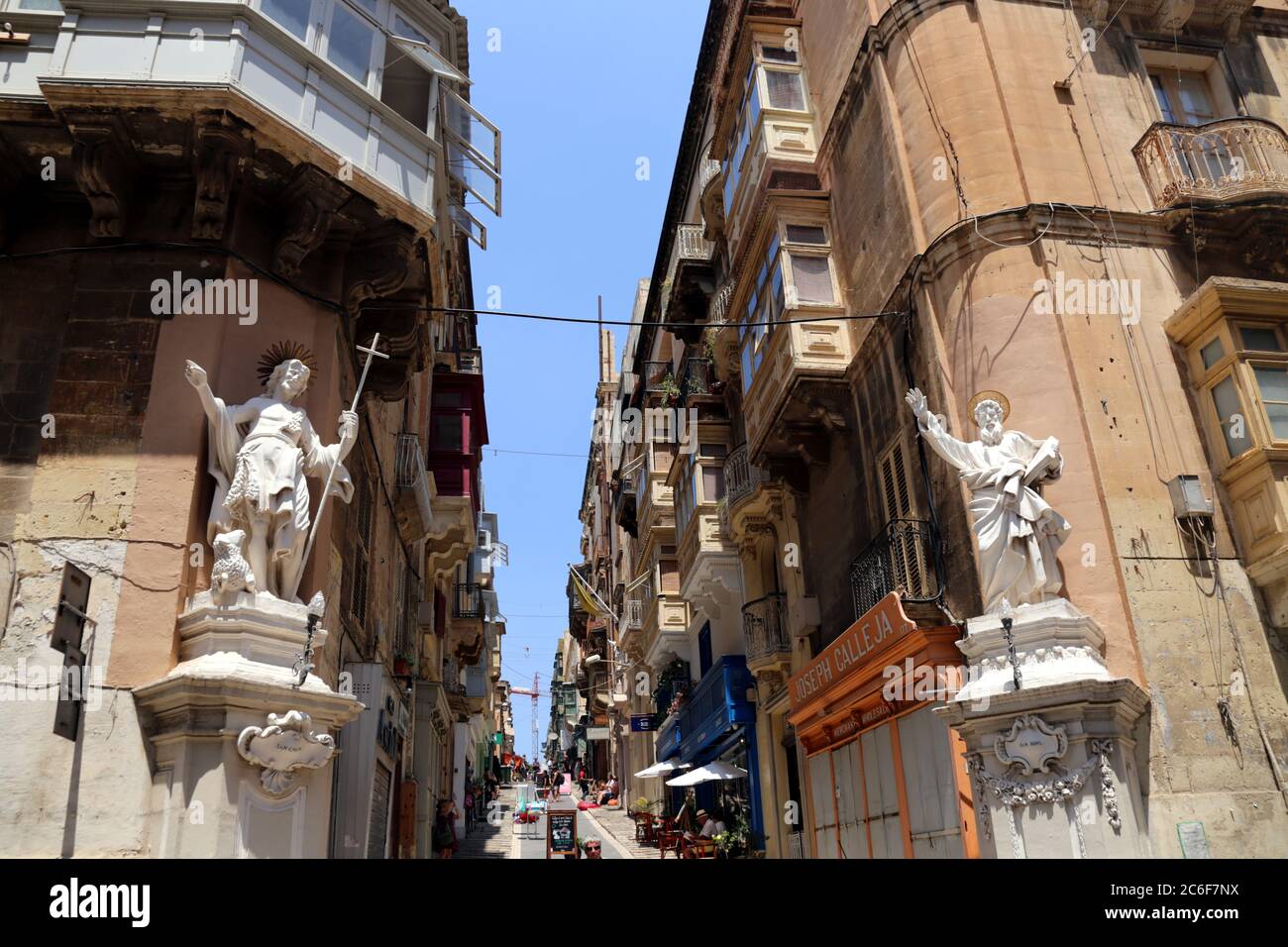 Valletta. Malta. Old Town. Statues of patron saints at the corners of ...
