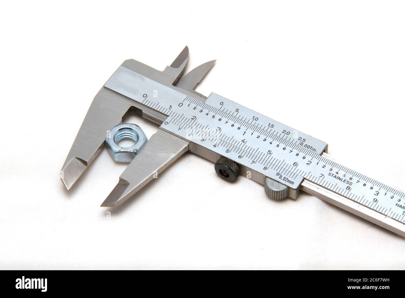 Image shows a close-up of a vernier caliper used for precise ...