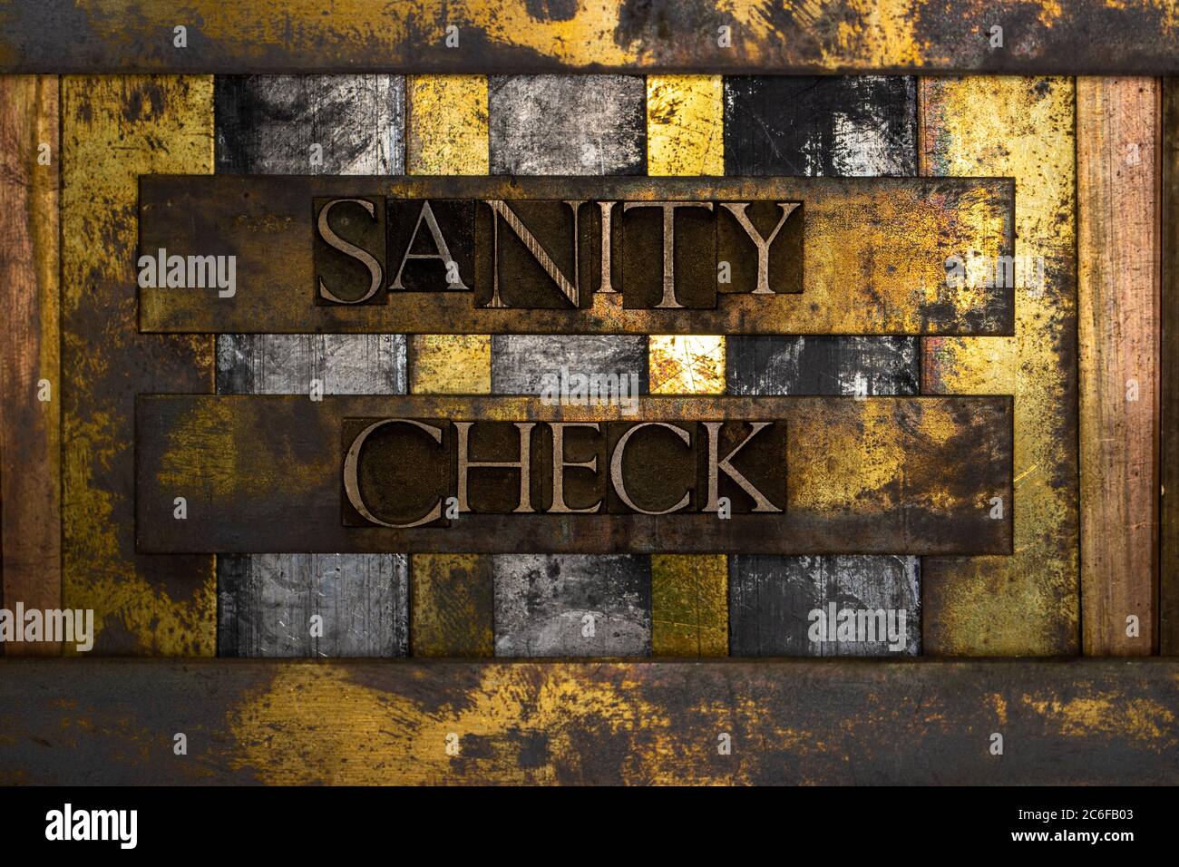 Sanity Check text formed with real authentic typeset letters on vintage ...