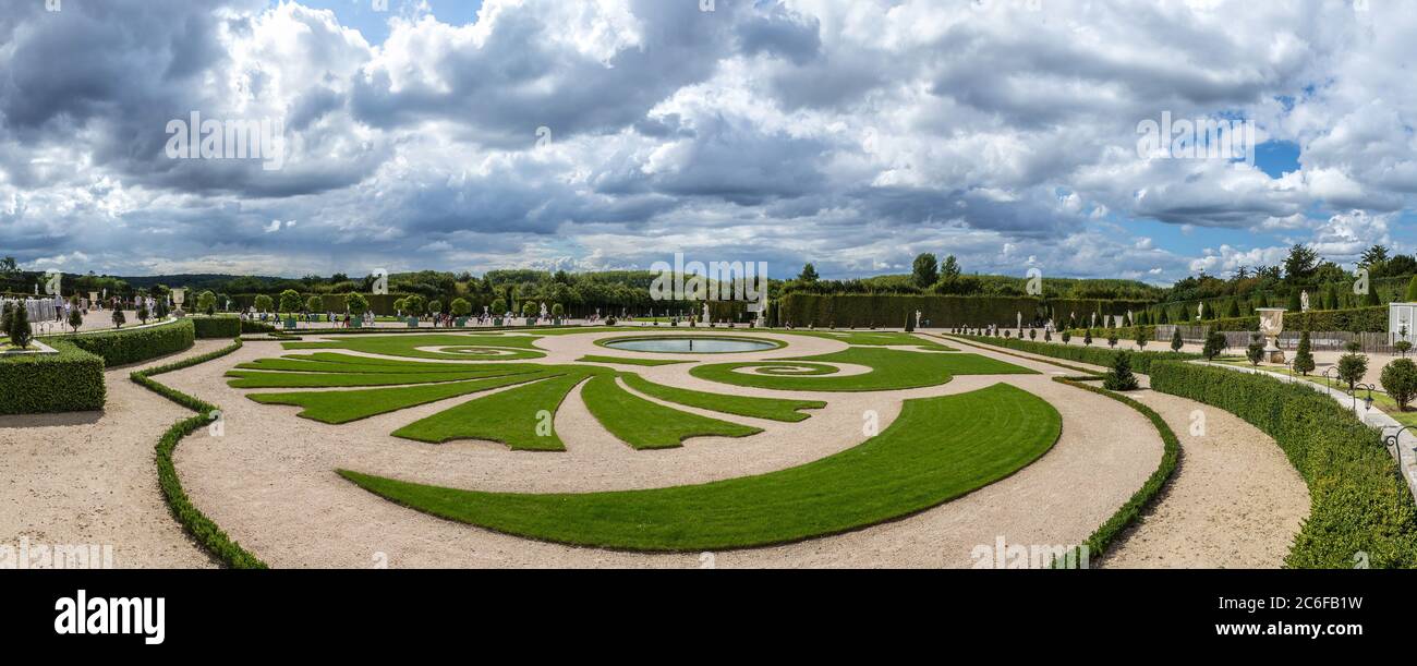 The Gardens of Versailles in a beautiful summer day in Paris, France ...
