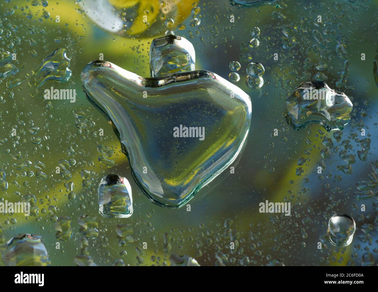 Water drops on liquid, abstract still-life Stock Photo - Alamy