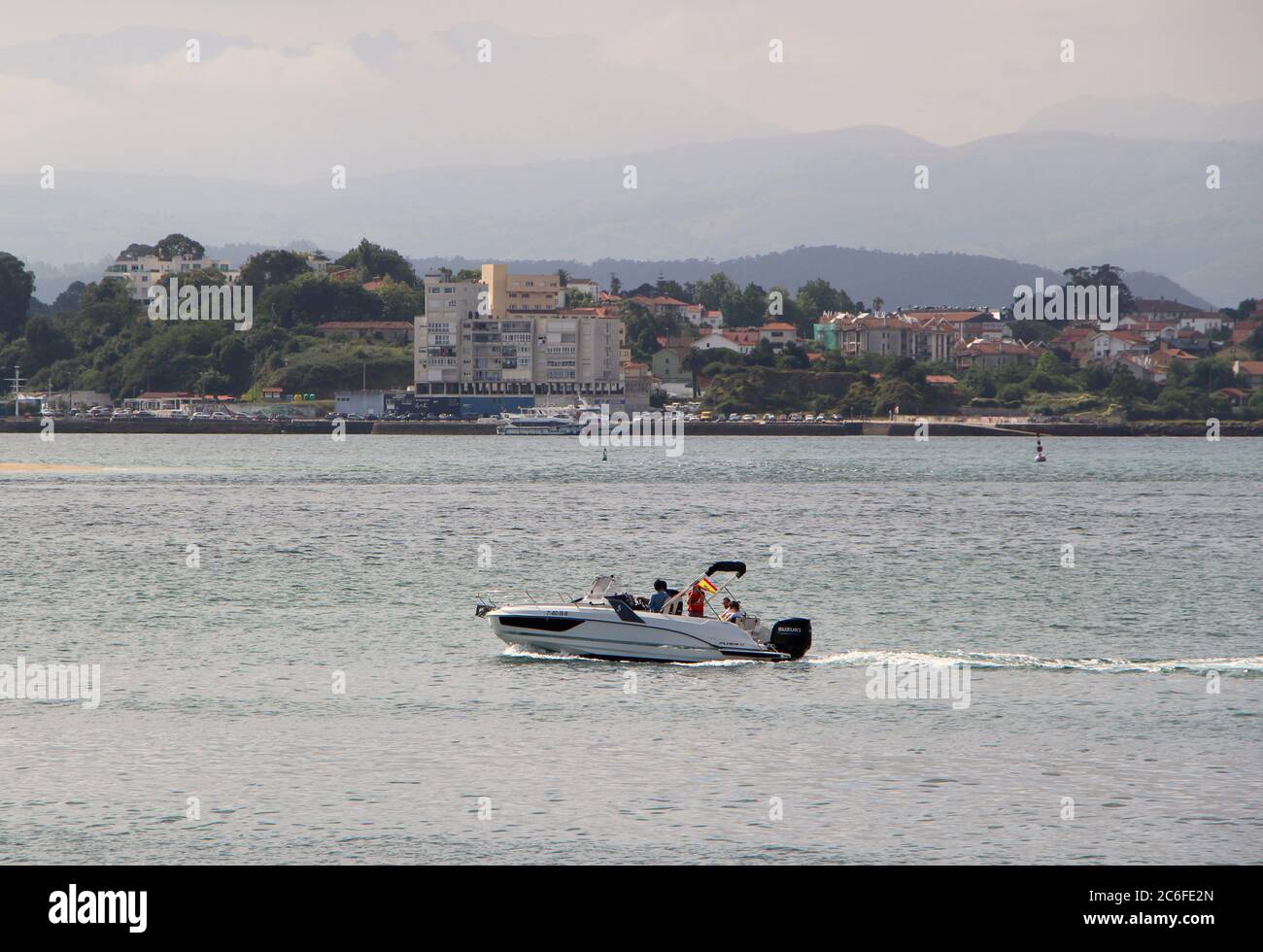 Speed boat travelling across the bay of Santander Spain on a summer ...