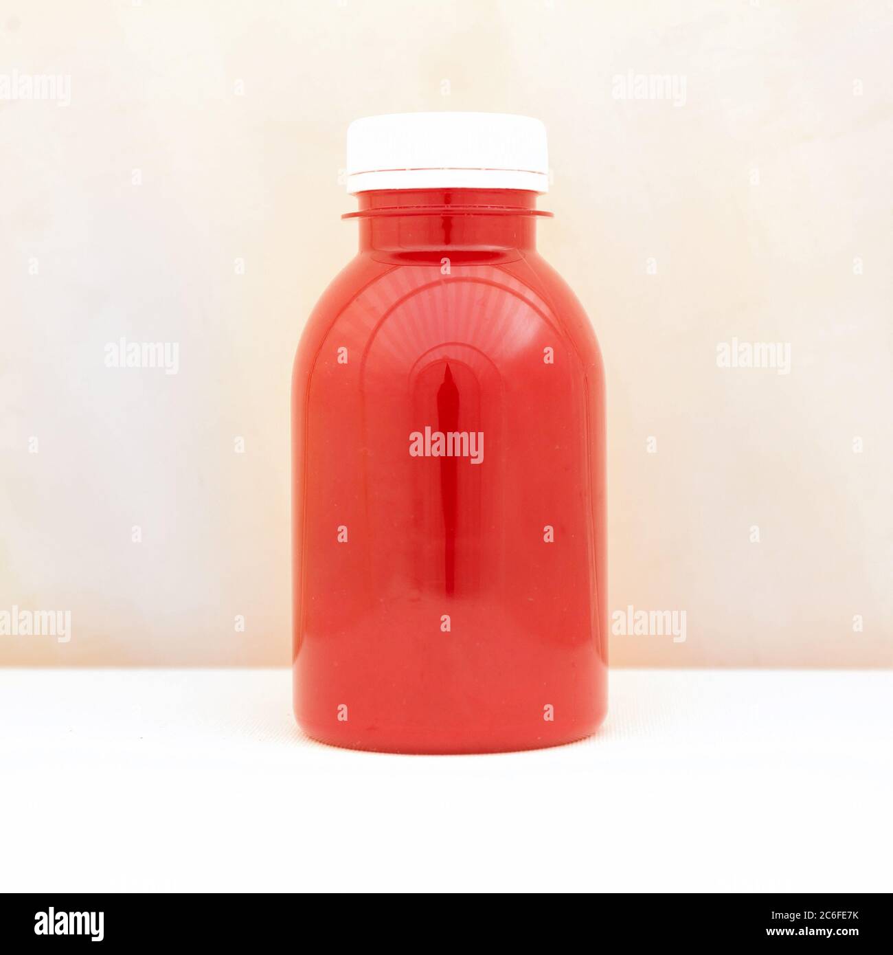 Fresh Red Berry Fruit Juice in Plastic Bottle Stock Photo - Alamy