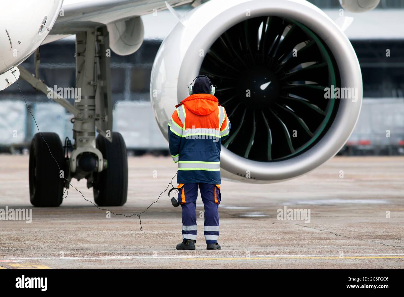 A ground control manager controls start turbofan engine process before ...