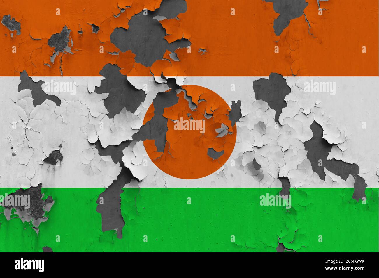 Niger flag close up painted, damaged and dirty on wall peeling off ...