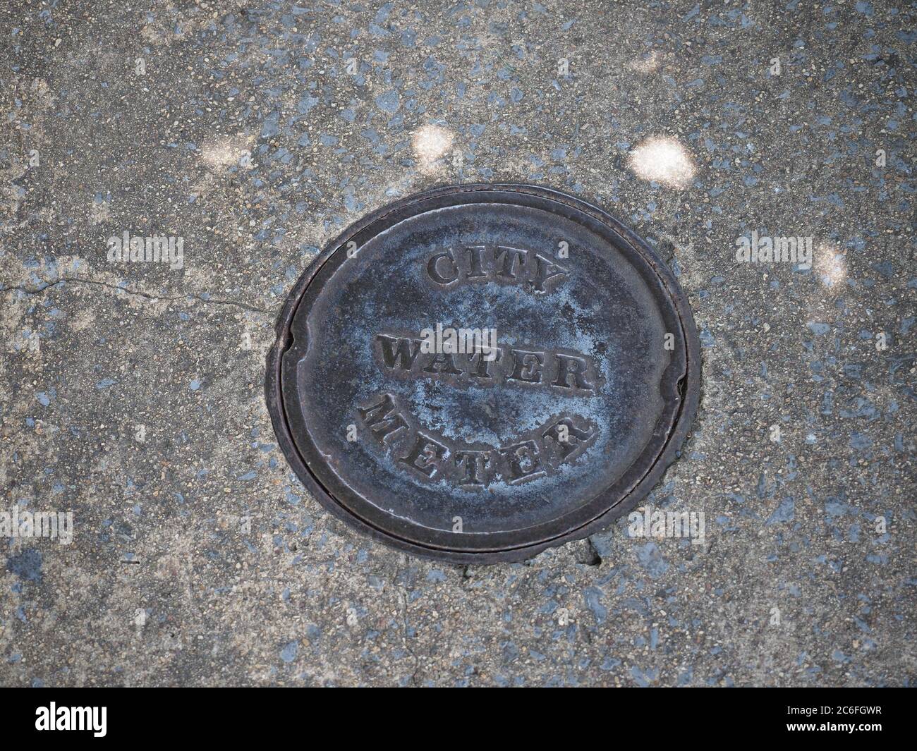 Water meter manhole Stock Photo - Alamy