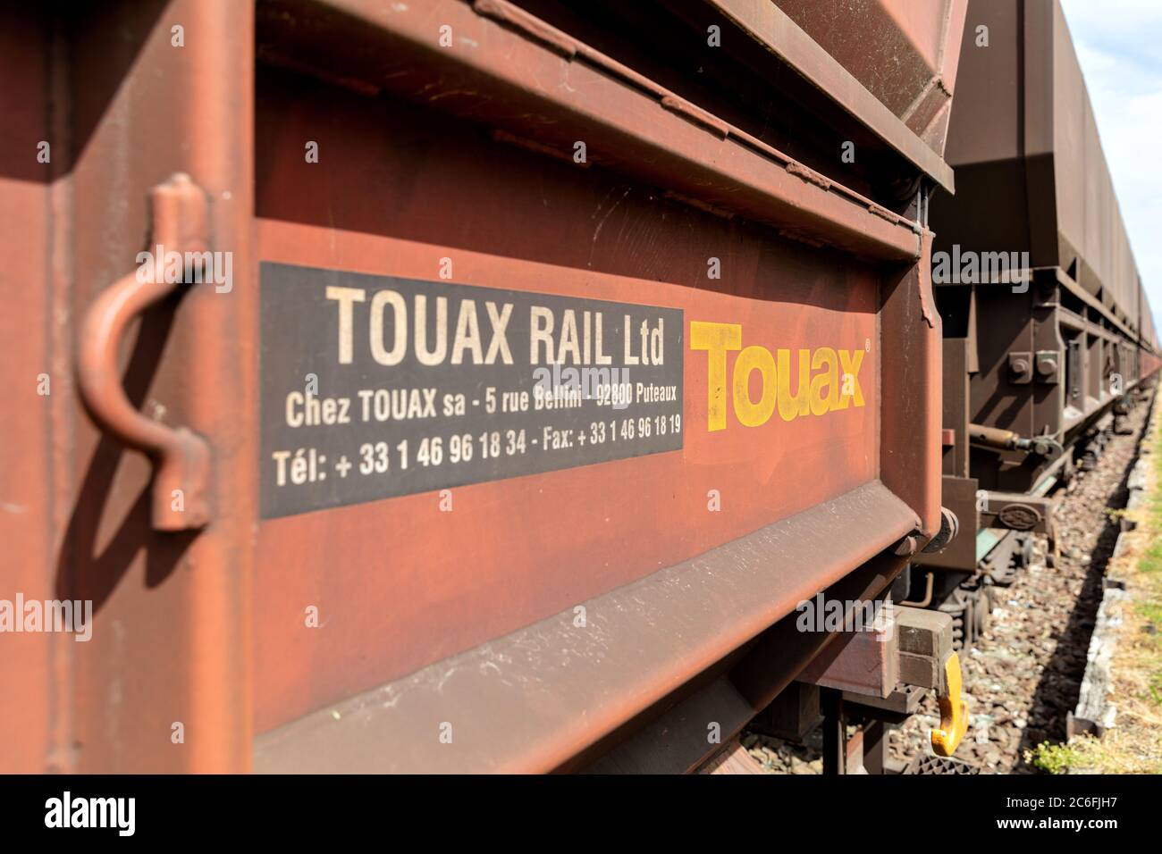 Touax logo at freight railcar. Touax is a French operational leasing ...