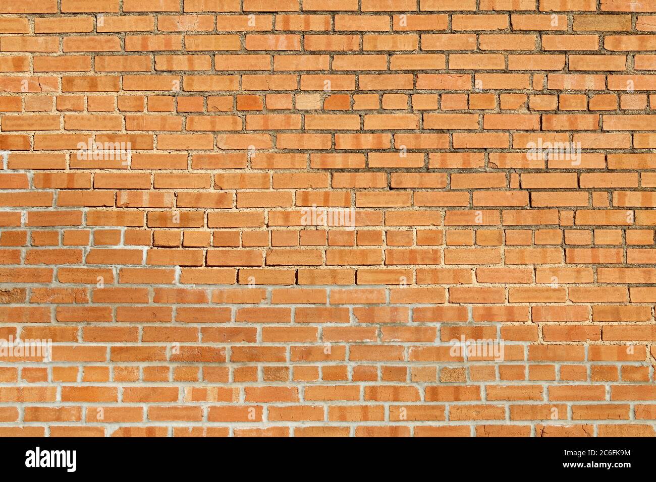 a faded decay yellow brick wall backdrop background Stock Photo - Alamy
