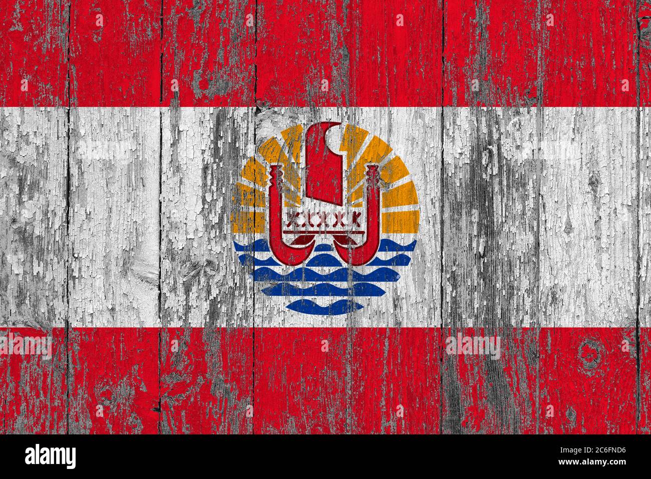 French Polynesia flag on grunge scratched wooden surface. National ...