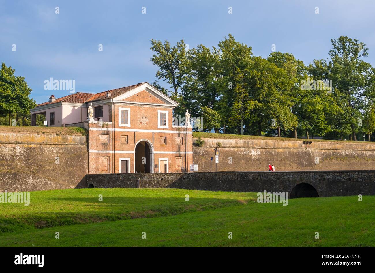 Lucca, Italy - August 17, 2019: Medieval surrounding wall of Lucca with ...