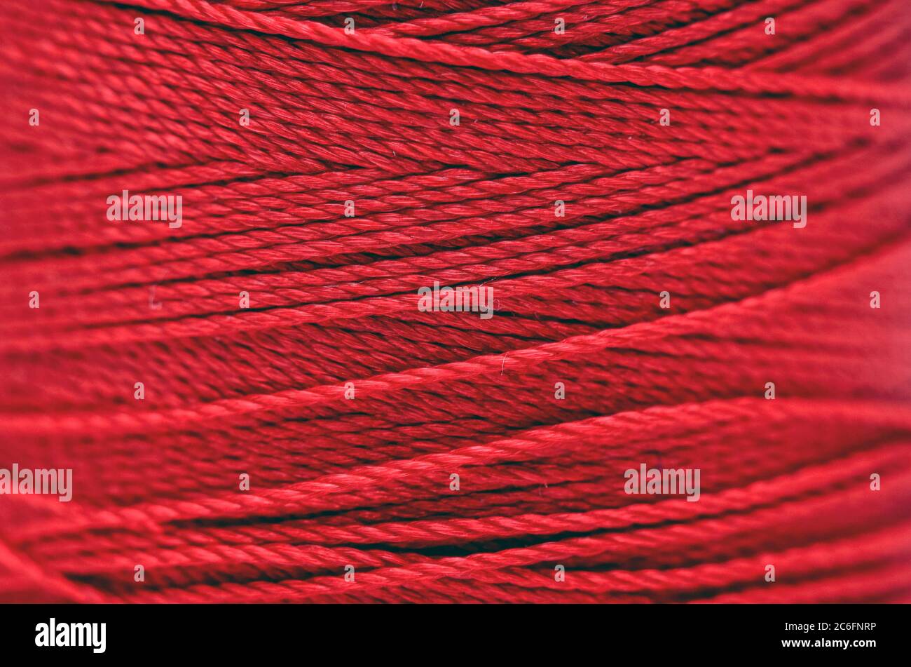 Close up red sewing rope Stock Photo - Alamy