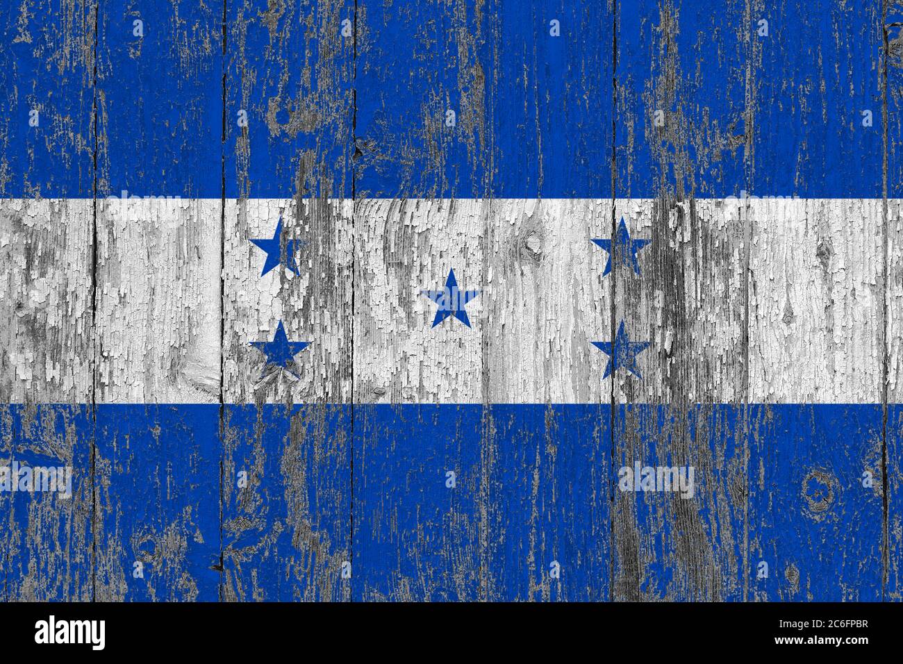 Honduras flag on grunge scratched wooden surface. National vintage ...