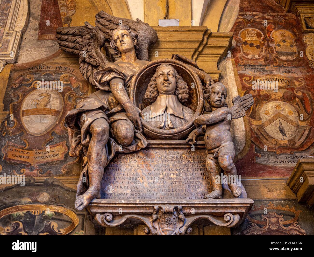 Carved plaque on the portico wall of inner courtyard of Archiginnasio ...