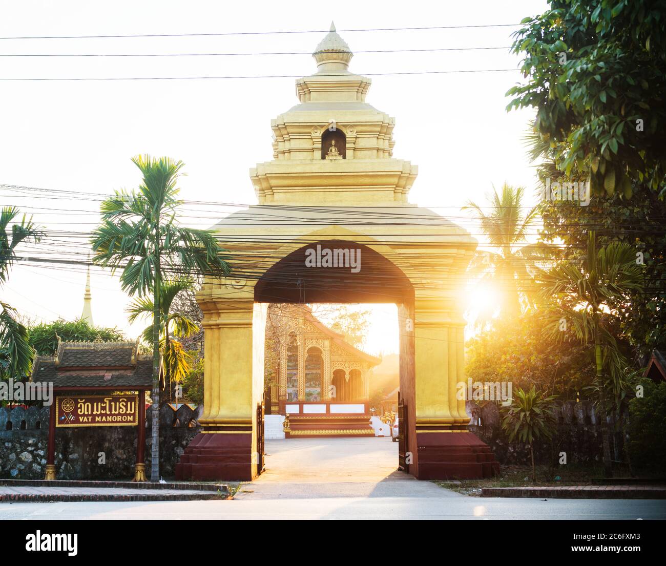 Entrance to wat manorom temple at sunset, Luang Prabang, Laos ...