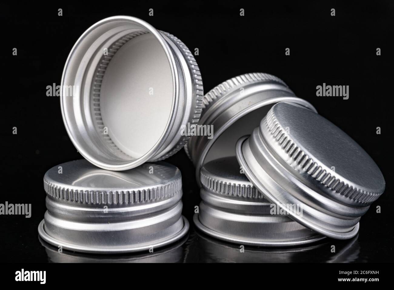 Metal caps for plastic bottles. Closures for disposable containers ...