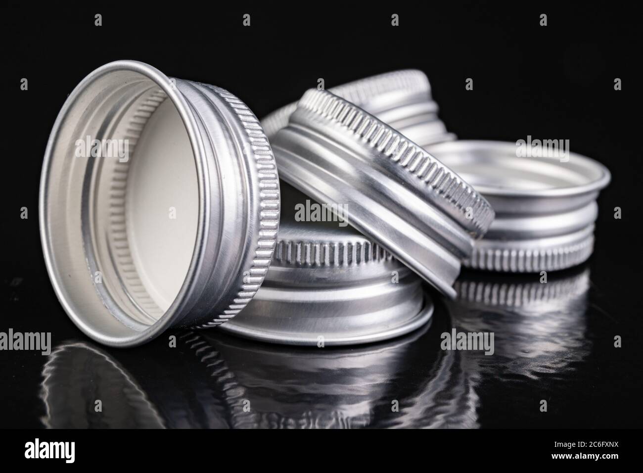 Metal caps for plastic bottles. Closures for disposable containers ...