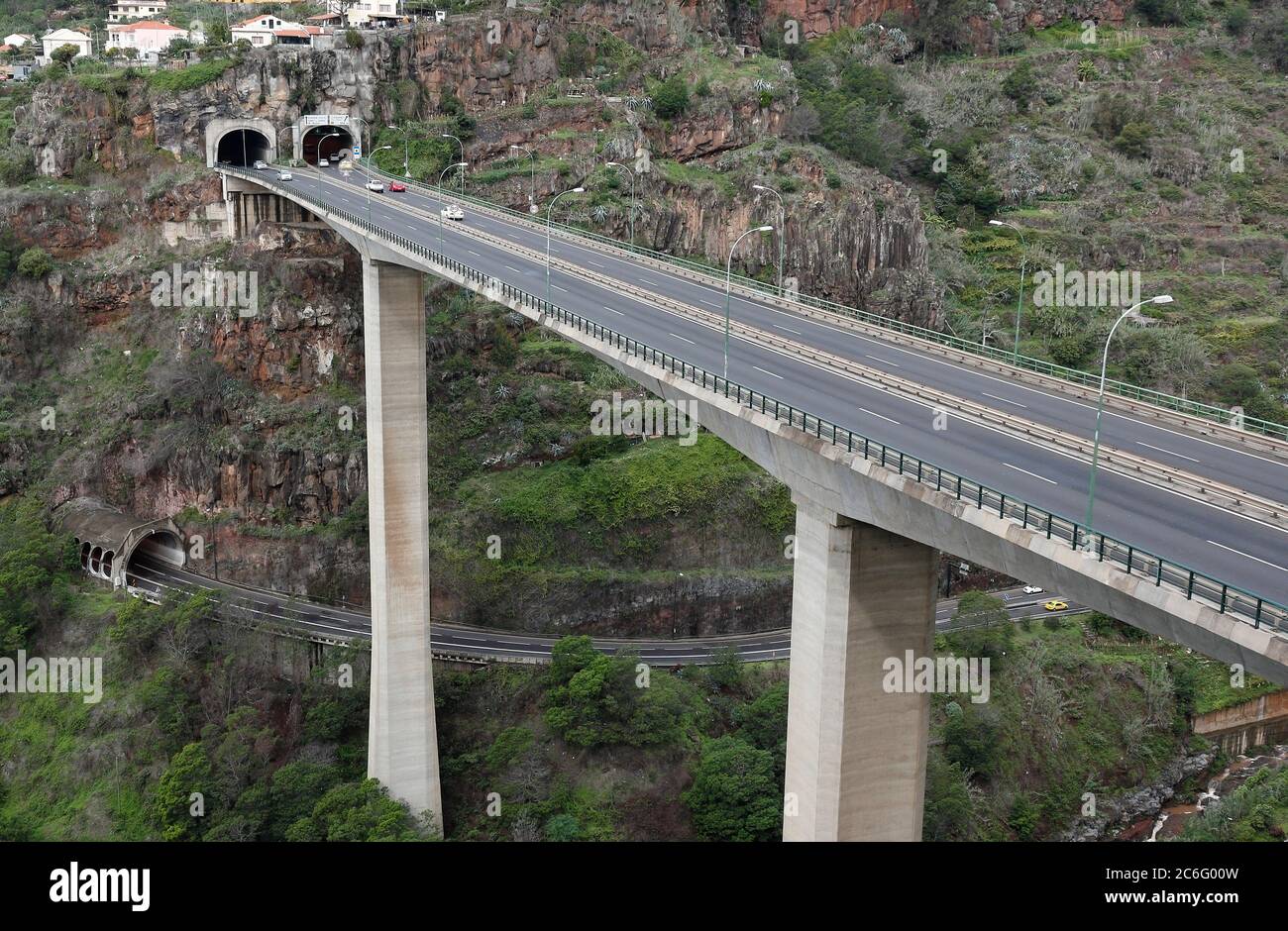 Transport and road infrastructure through mountains Stock Photo - Alamy