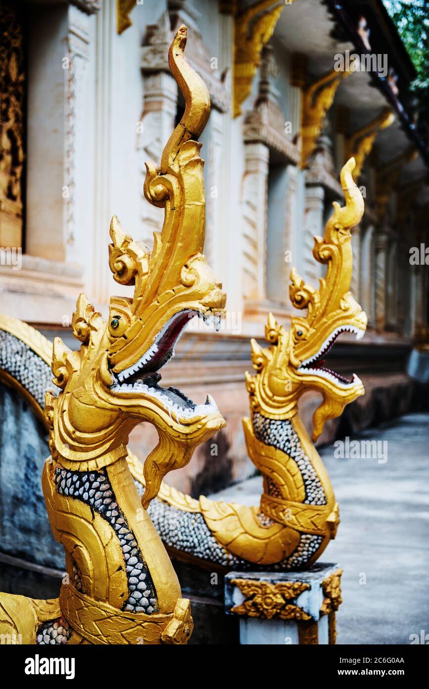 Golden dragon statue in Vientiane, Laos, Southeast Asia Stock Photo - Alamy