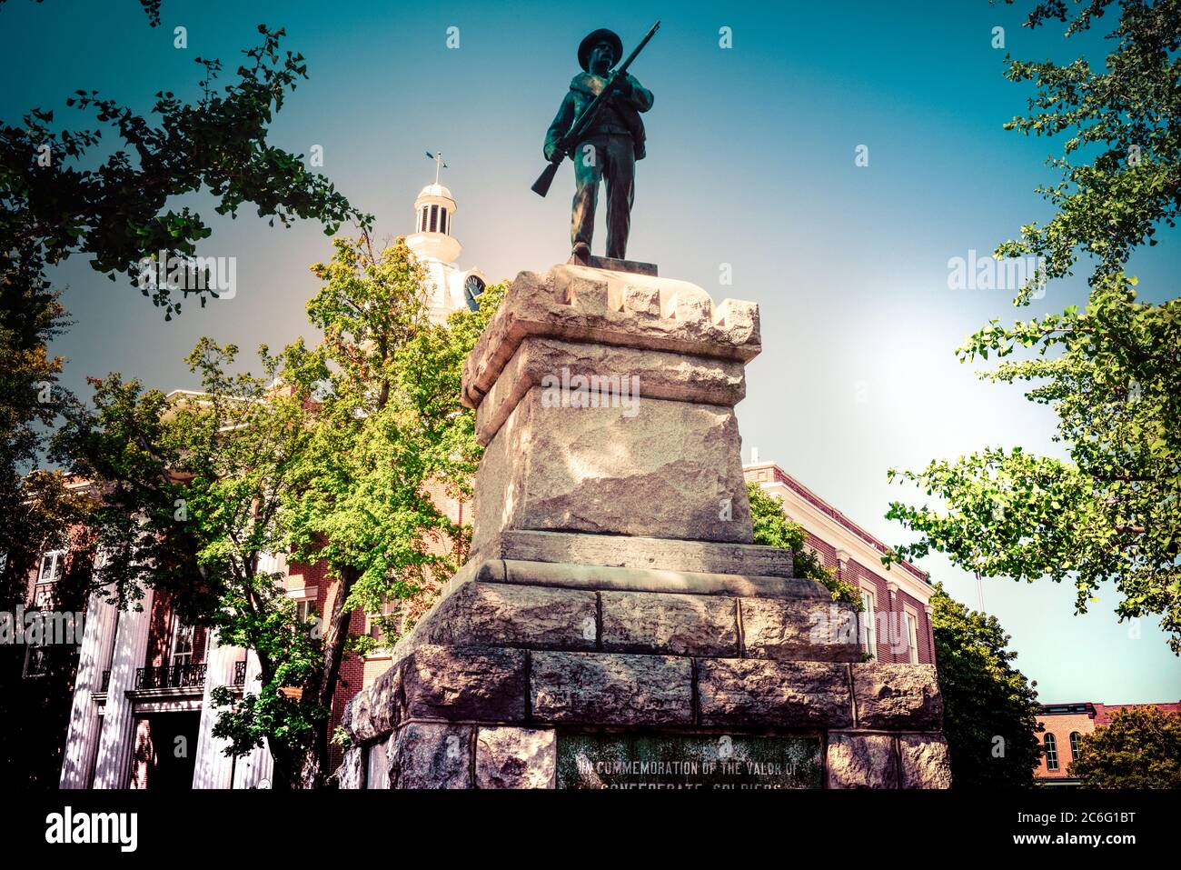 A commemorative Confederate Solider Statue on plinth base with plaque ...