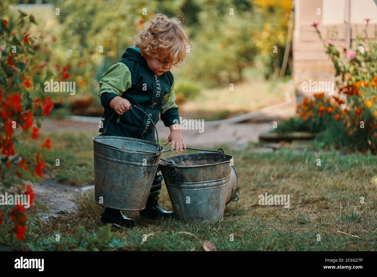 Boys playing in back garden hi-res stock photography and images - Alamy