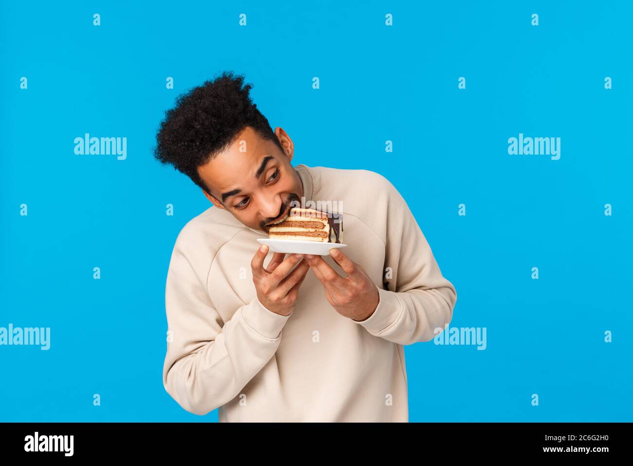 Man eating cake face hi-res stock photography and images - Alamy