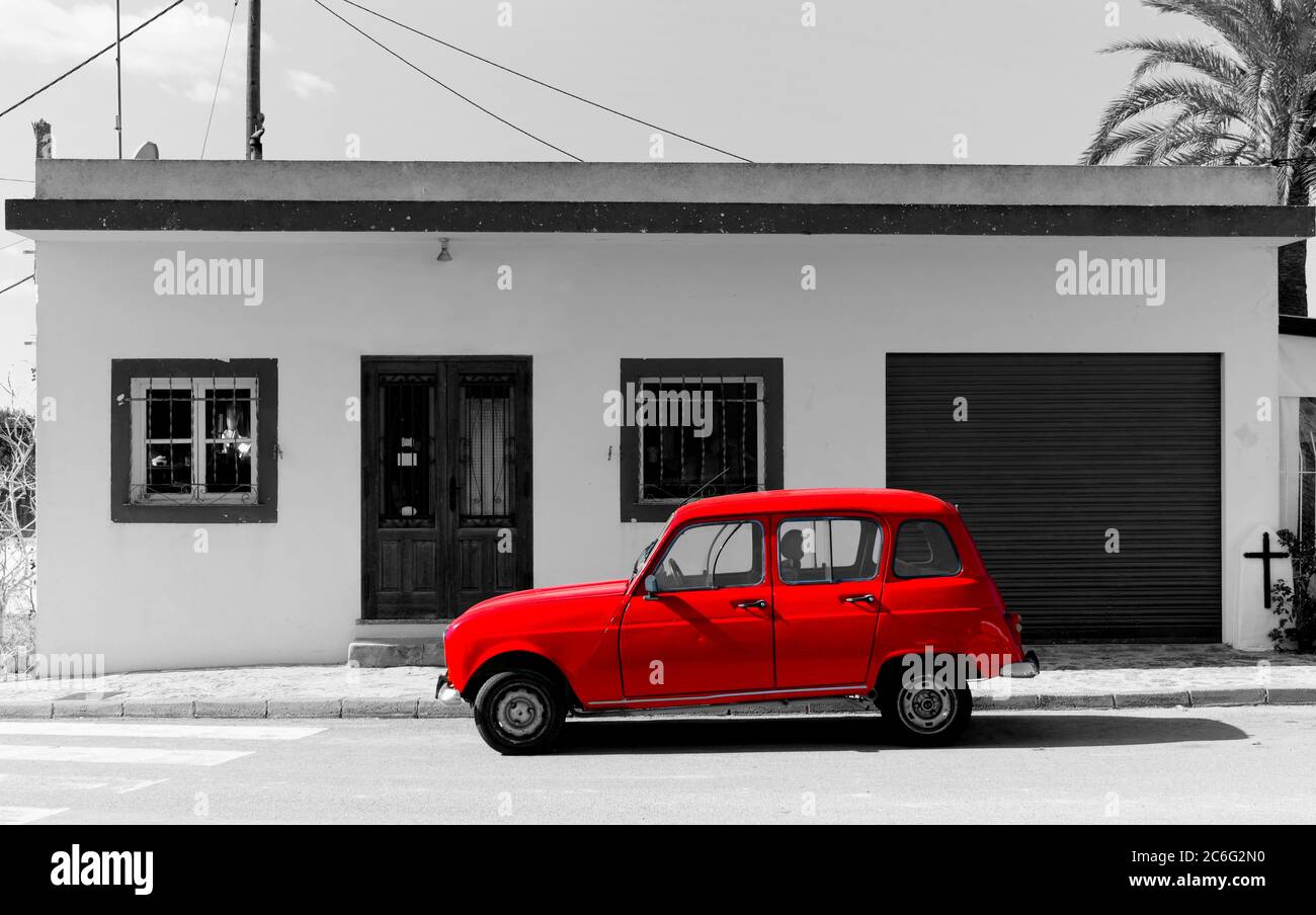 Red Car in a Mediterranean setting Stock Photo - Alamy