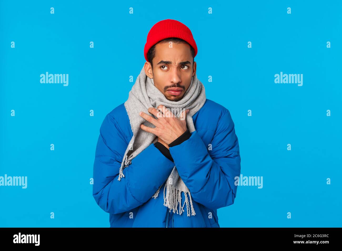 Silly and sad, moody african-american guy acting childish sulking ...