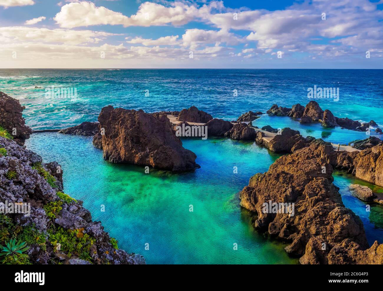 Landscape with natural volcanic formation pools on the coast of Porto ...