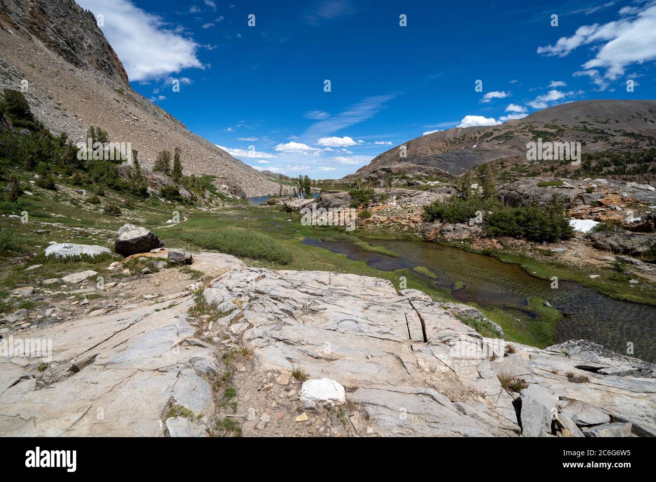 Slick rock along the hiking trail of 20 Lakes Basin in Mono County ...