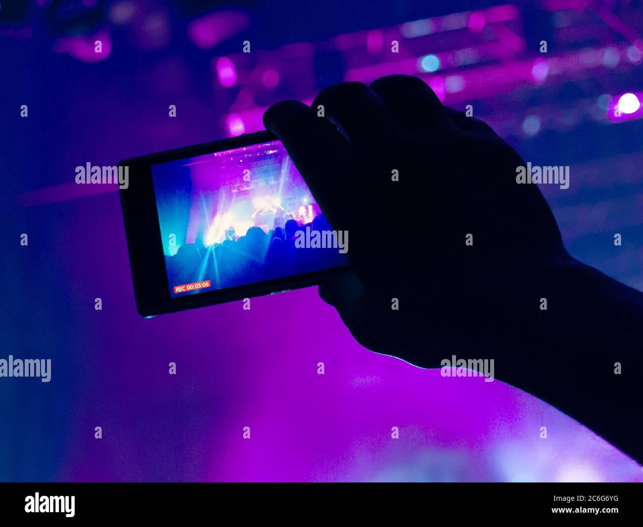 Concert photography with a smartphone during a music festival Stock ...