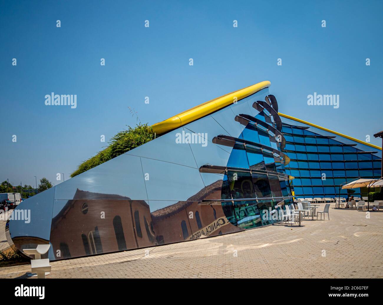 Reflective exterior of the Enzo Ferrari Museum. Designed by Jan ...