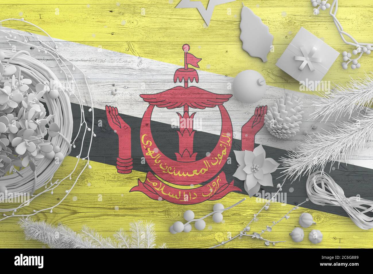 Brunei flag on wooden table with snow objects. Christmas and new year ...