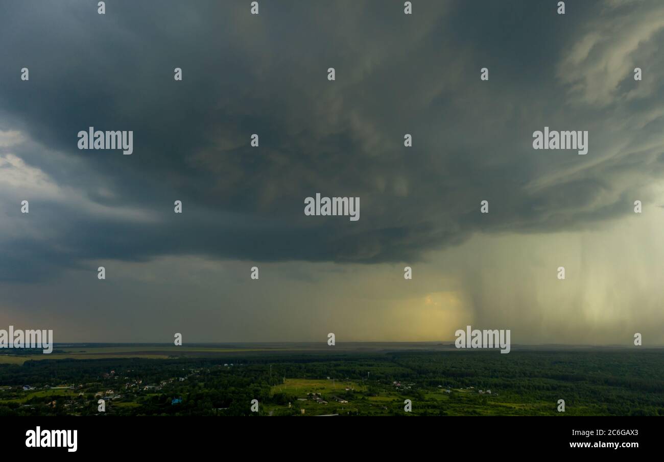 Aerial photo of storm clouds and rain that hit the locality Stock Photo ...