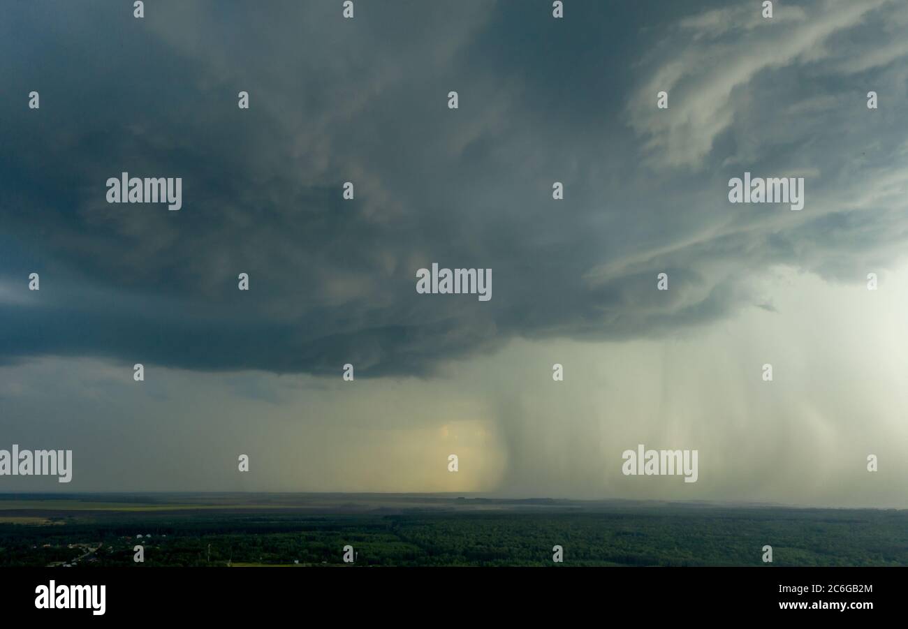 Aerial photo of storm clouds and rain that hit the locality Stock Photo ...