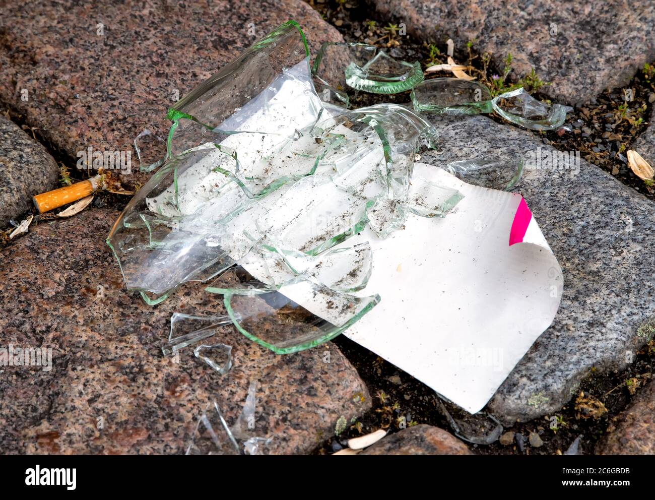 Risk of injury. Close up image of broken and shattered sharp pieces ...