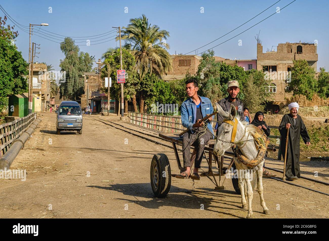Donkey cart in the streets of rural Egypt between Luxor and Dendera ...
