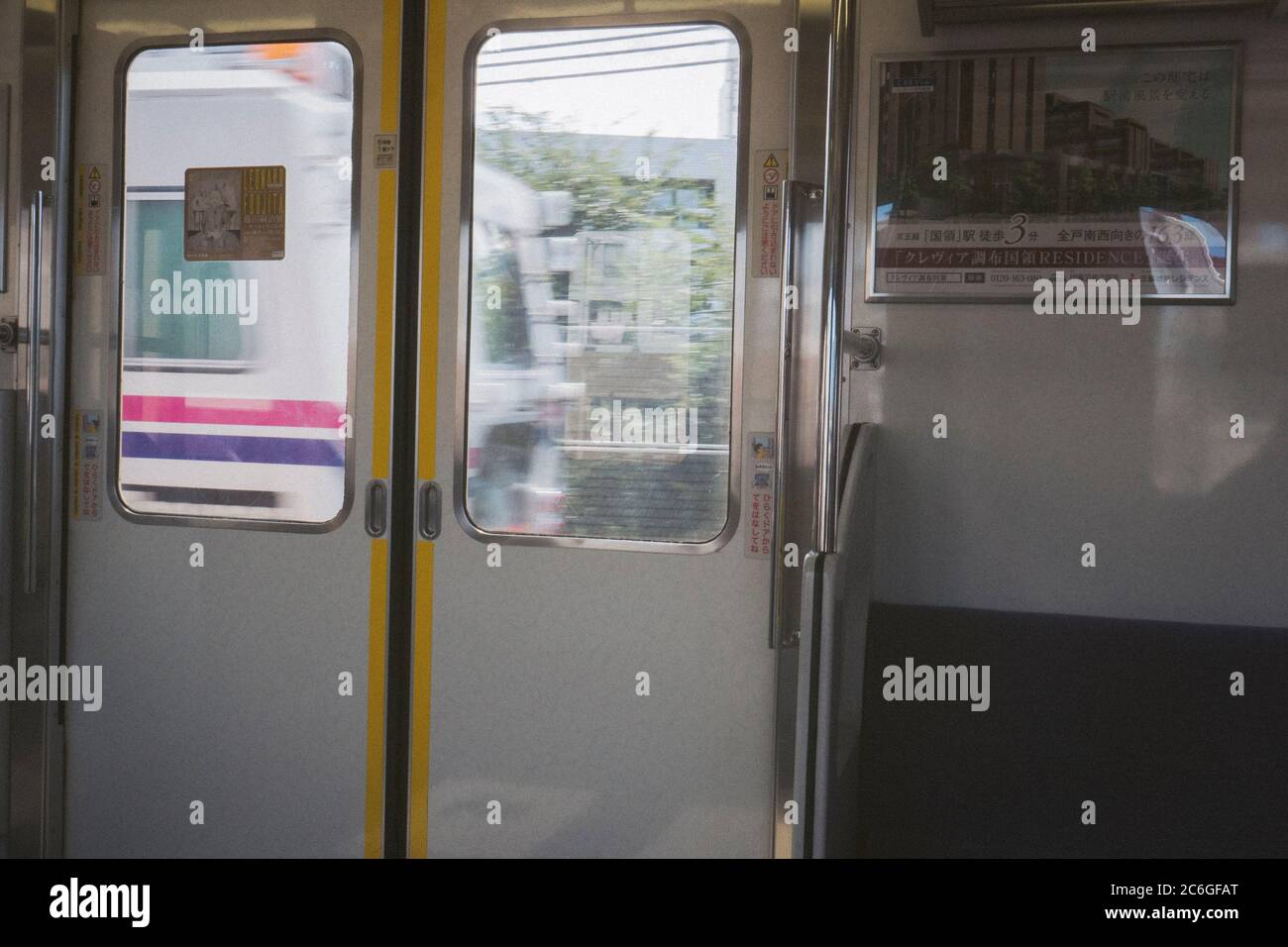 Train door, city of Tokyo Japan Stock Photo - Alamy
