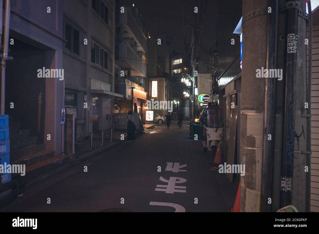 Narrow street in the dark, city of Tokyo Japan Stock Photo - Alamy