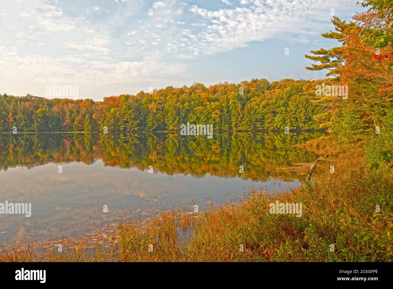 Fall Colors in the Morning on Mayflower Lake in the North Woods of Arrowhead Provincial Park in ...