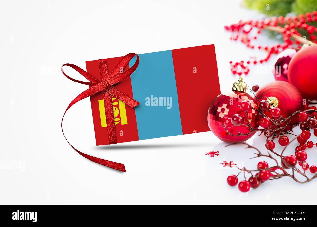 Mongolia flag on new year invitation card with red christmas ornaments ...