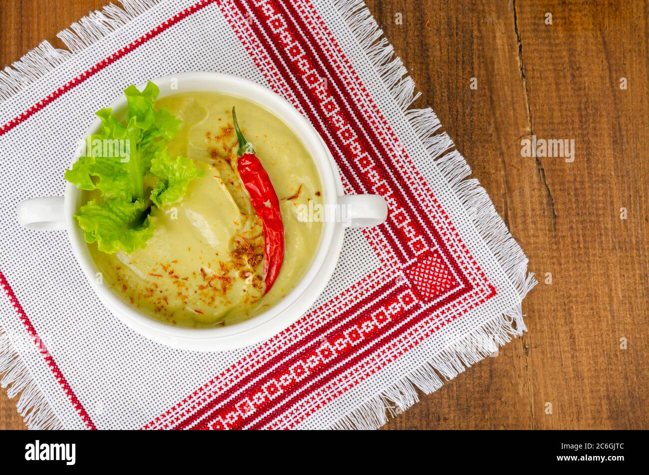 Spicy vegetarian vegetable puree soup green color, healthy eating Stock ...