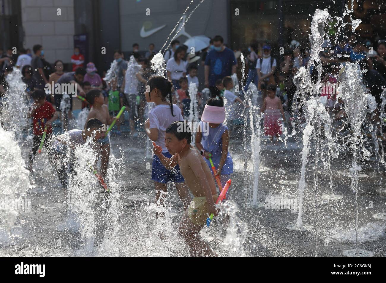 Children gather around hi-res stock photography and images - Alamy
