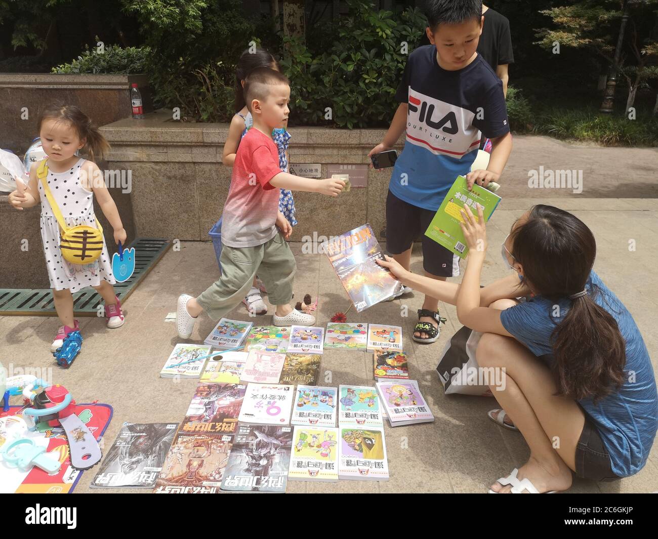 A unique bazaar for children to erect vendors and sell their toys is ...