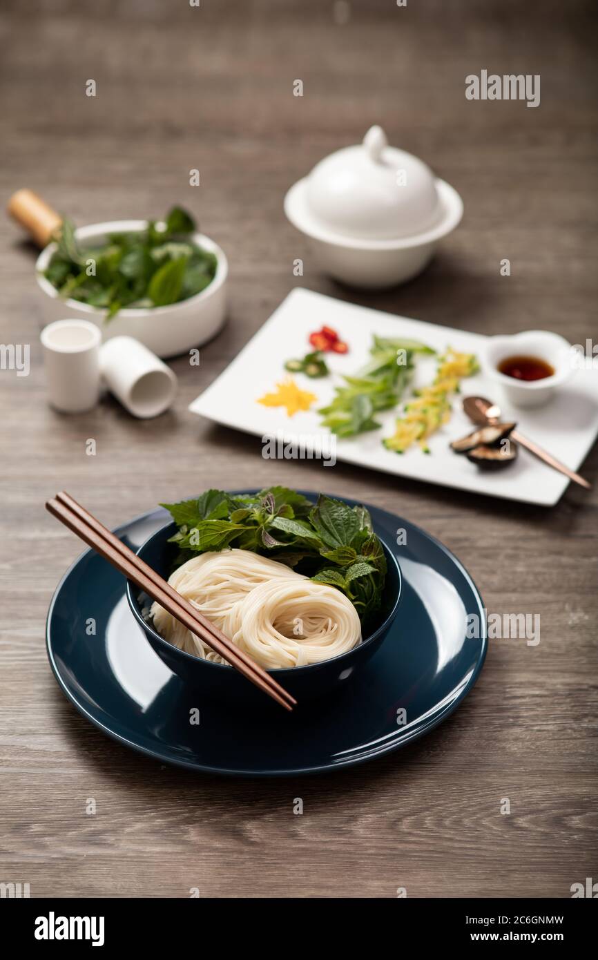korean noodle on the table (with perilla leaf Stock Photo - Alamy