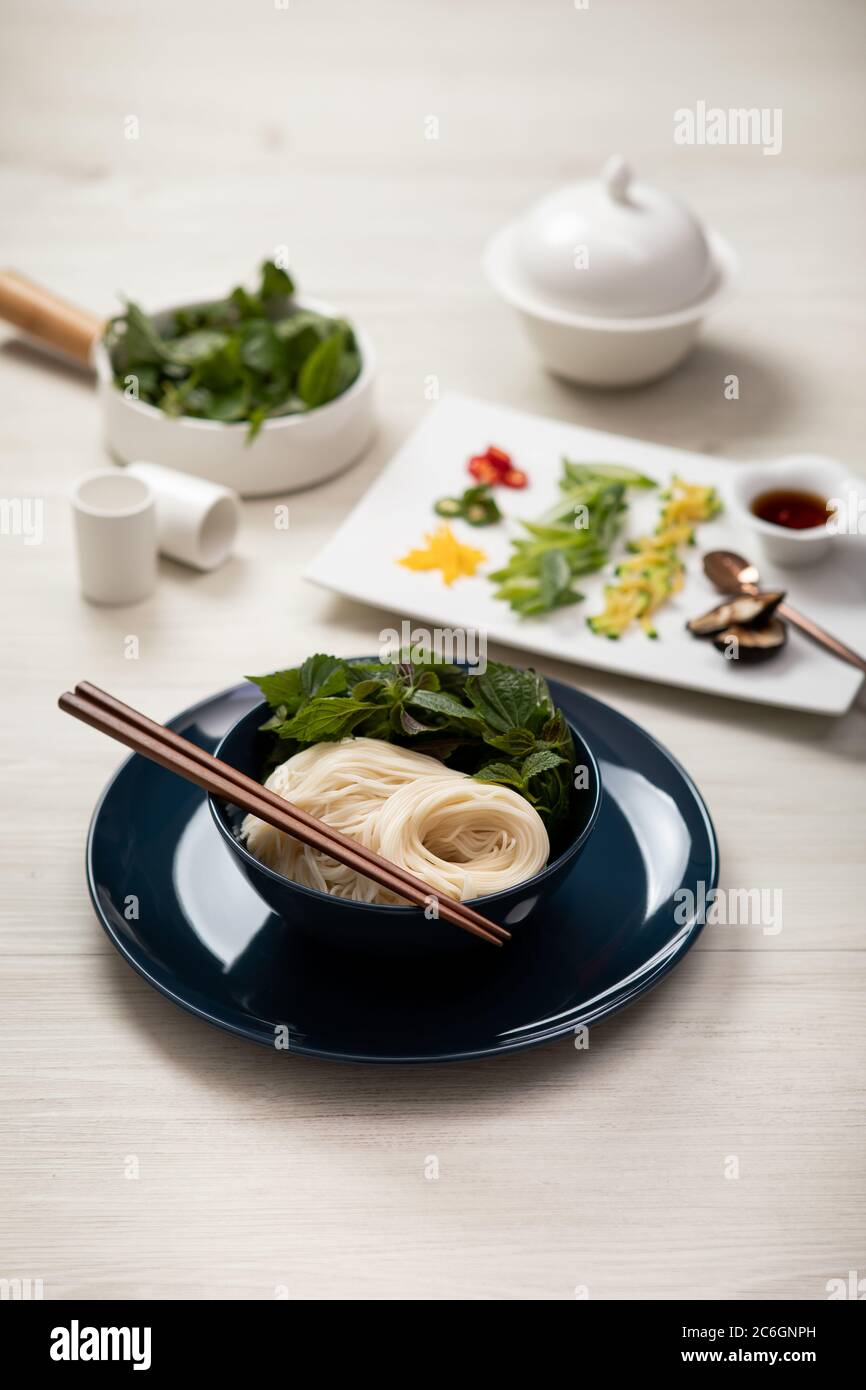 korean noodle on the table (with perilla leaf Stock Photo - Alamy