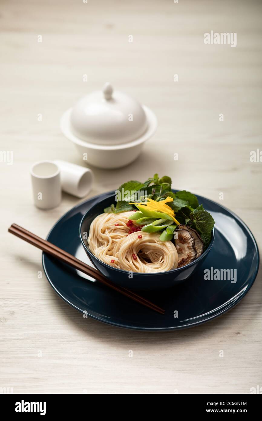 korean noodle on the table (with perilla leaf Stock Photo - Alamy