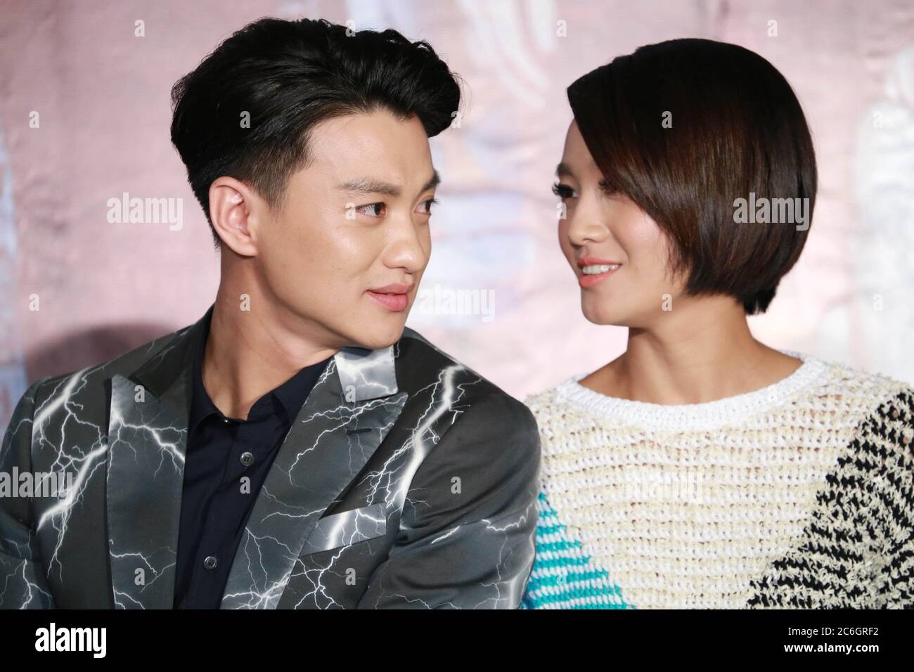 --File--Chinese actor Zhou Yiwei and his wife, a Chinese actress and tv host Zhu Dan or Dani ...