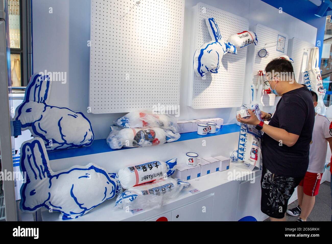 People shop for White Rabbit ice-cream at a White Rabbit popup store in ...