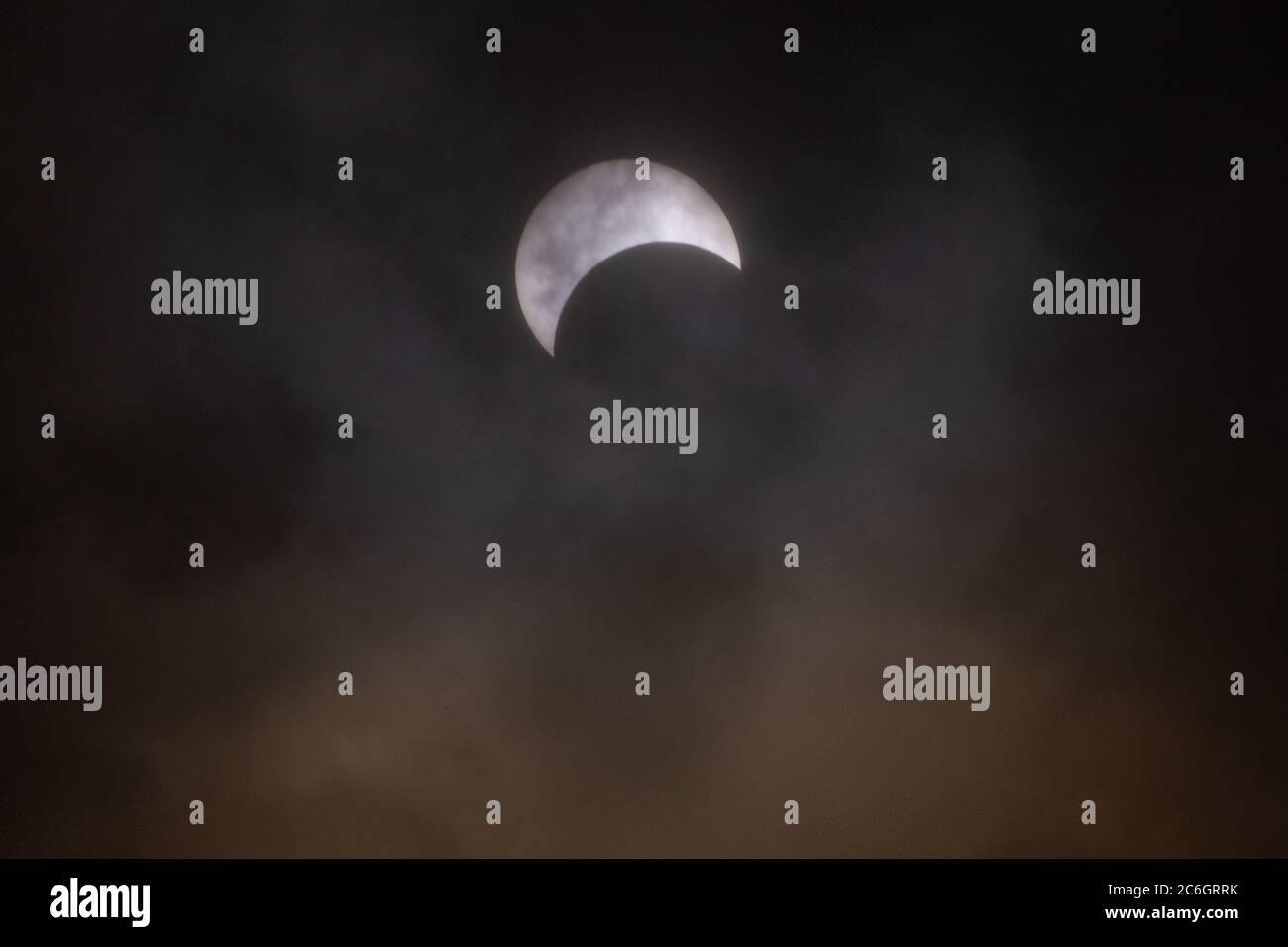 A solar eclipse is captured in Guangzhou city, east China's Guangdong ...